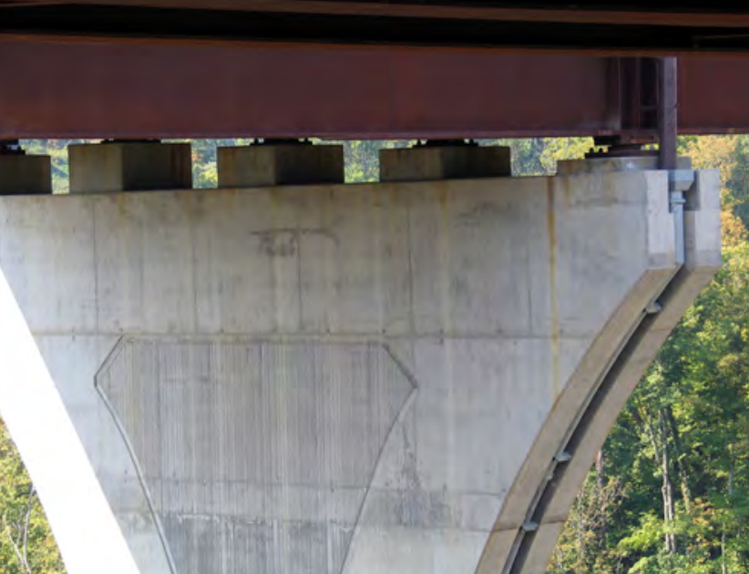 What is the minimum required vertical load for an HLMR bearing?